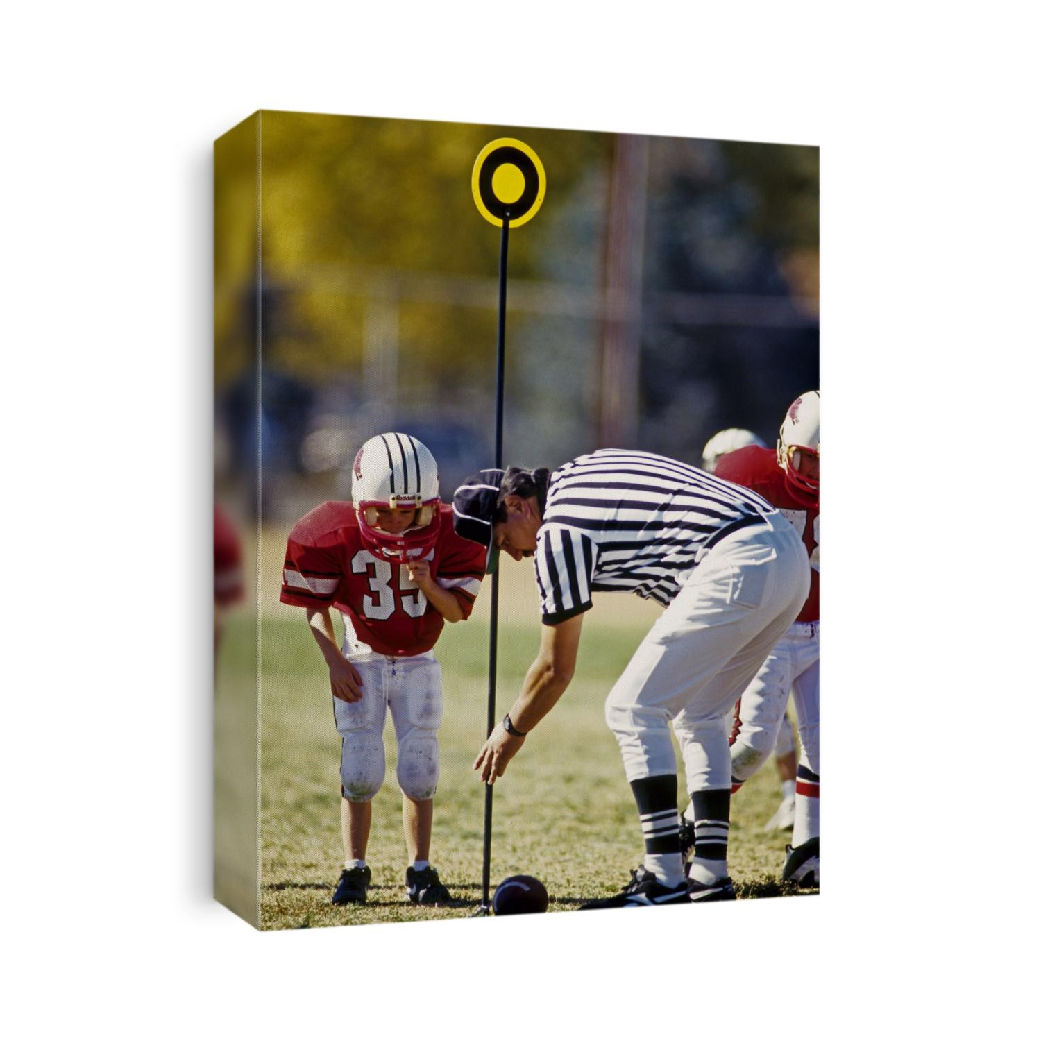 Referee Measuring For A First Down During A During A Pee Wee Football ...